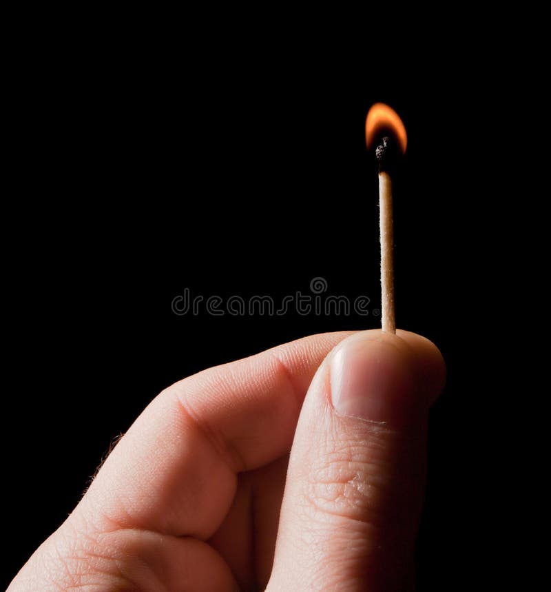 Woman Hand Holding Match Stick Against Blue Background. Stock Photo ...