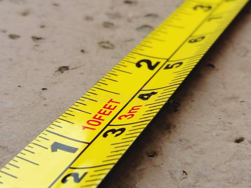 Hand Measuring Tape Close Up Stock Photo - Image of measuring, yellow ...