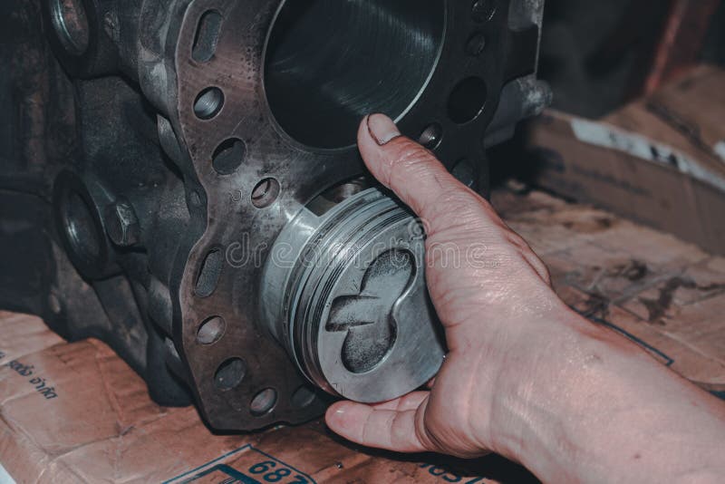 Hand of a Mechanic Checking an Engine Stock Photo - Image of mechanic ...