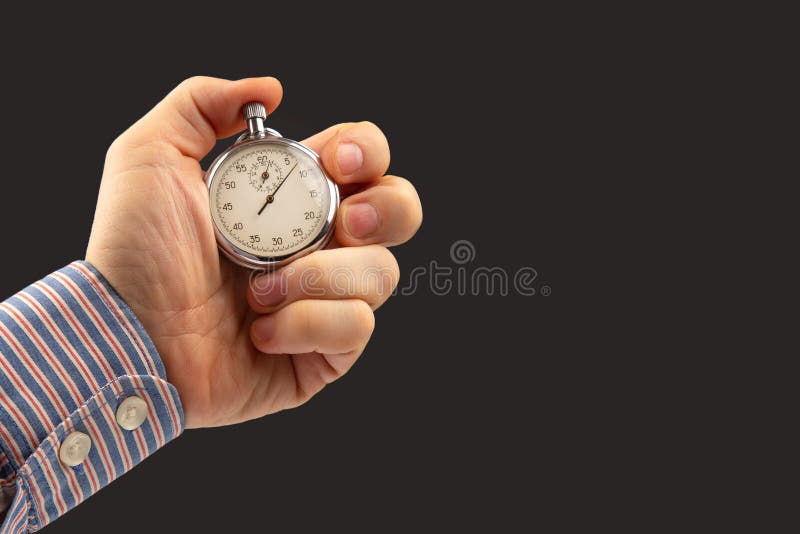 Hand with a Mechanical Analog Stopwatch on a White Background. Time ...