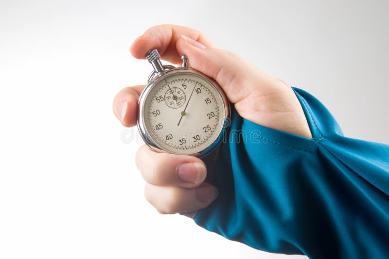 Hand with a Mechanical Stopwatch on a White Background. Time Part ...