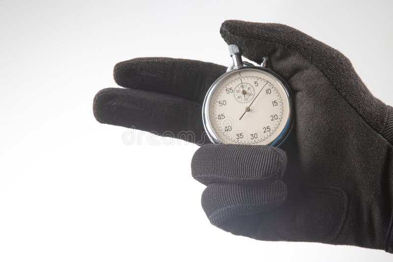 Hand with a Mechanical Stopwatch on a White Background. Time Part ...