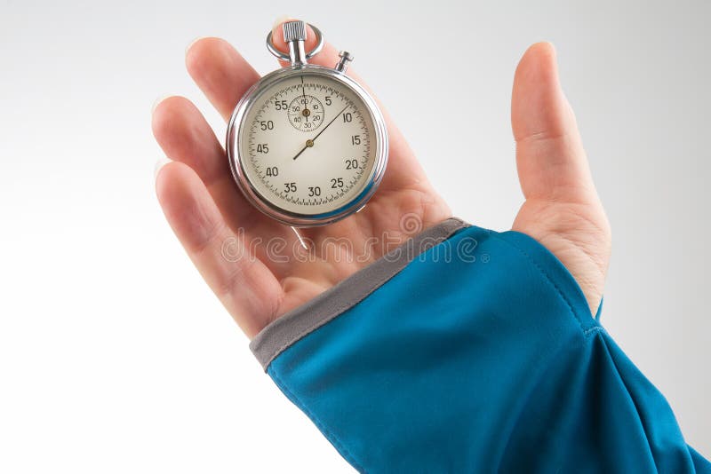 Hand with a Mechanical Stopwatch on a White Background. Time Part ...