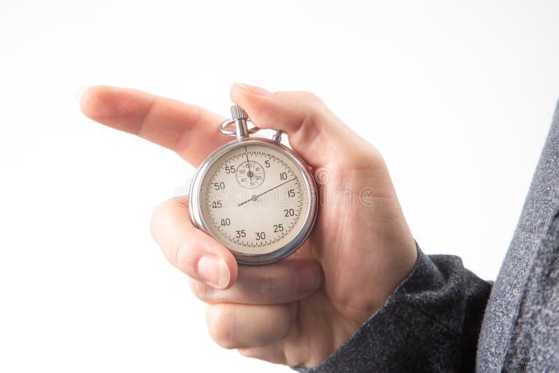 Hand with a Mechanical Stopwatch on a White Background. Time Part ...