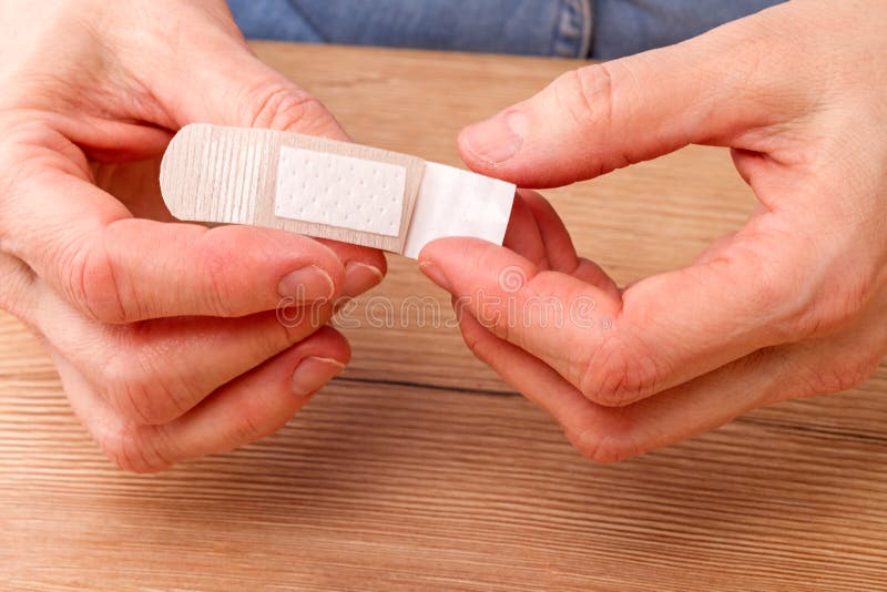 Hand with medical plaster stock image. Image of medicine - 66950611