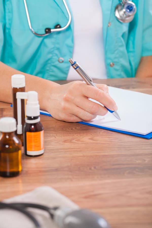 Hand of a Medical Worker with Ballpoint Pen Stock Photo - Image of form ...