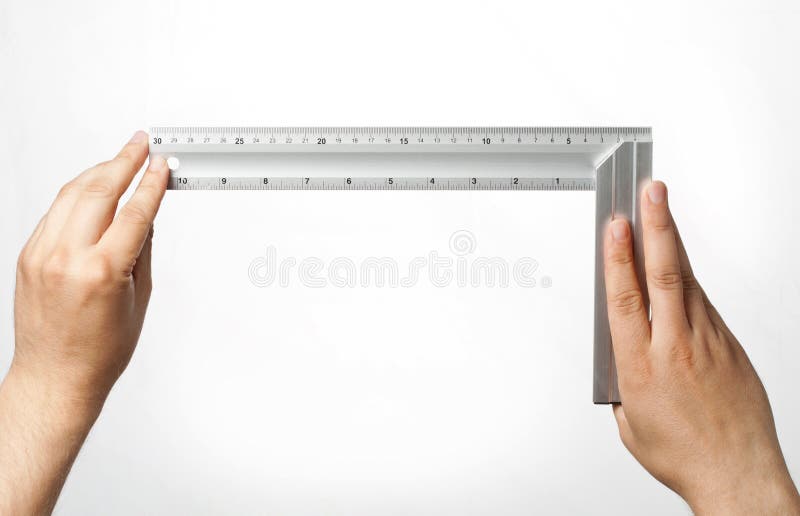 Hand with metal angle tool stock photo. Image of support - 34727292