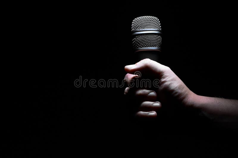 Hand and microphone stock image. Image of metal, hand - 29191377