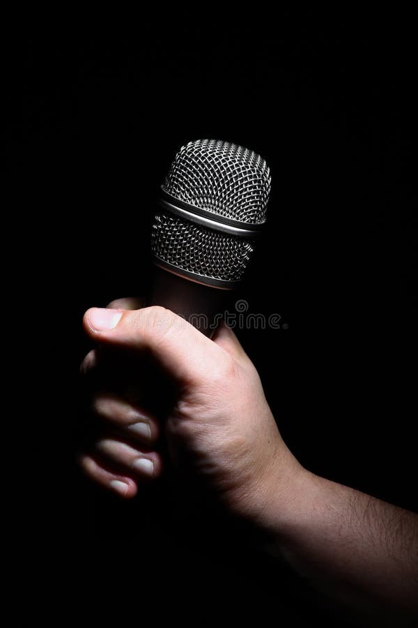 Hand and microphone stock image. Image of metal, hand - 29191377