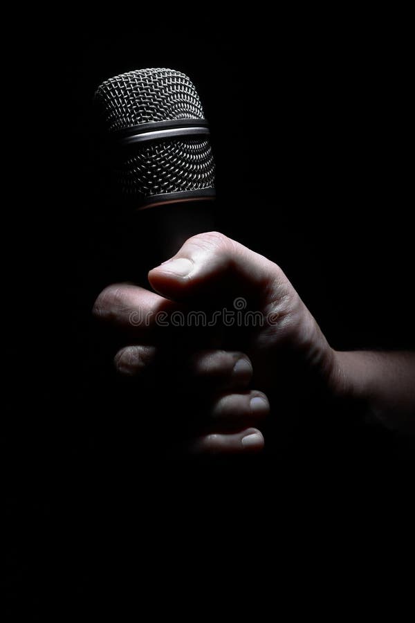 Hand and microphone stock image. Image of metal, hand - 29191377