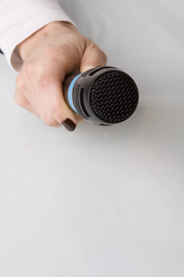 Hand with microphone stock image. Image of metal, microphone - 5326411