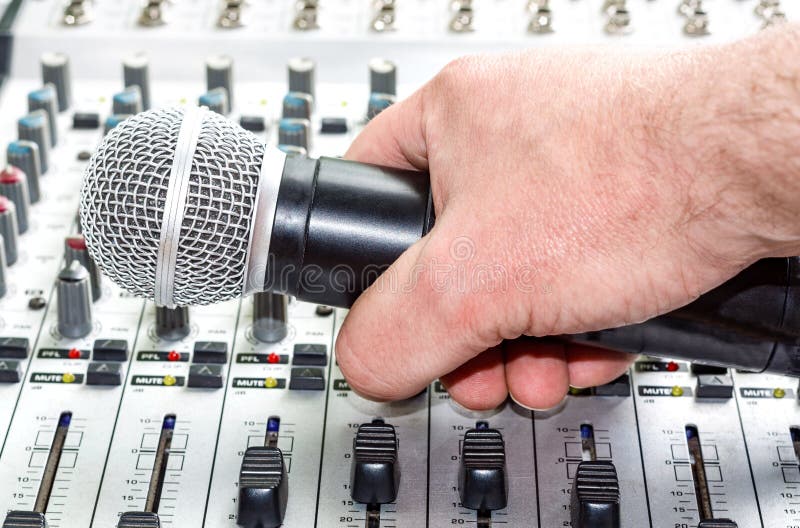 Hand with microphone stock image. Image of control, audio - 72758599
