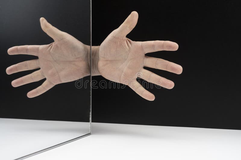 Hand and mirror stock photo. Image of difference, masculine - 214669266