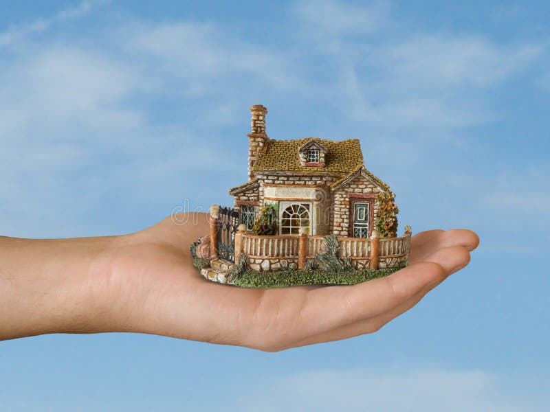 Hand mit Haus stockbild. Bild von himmel, palme, hand - 1291165
