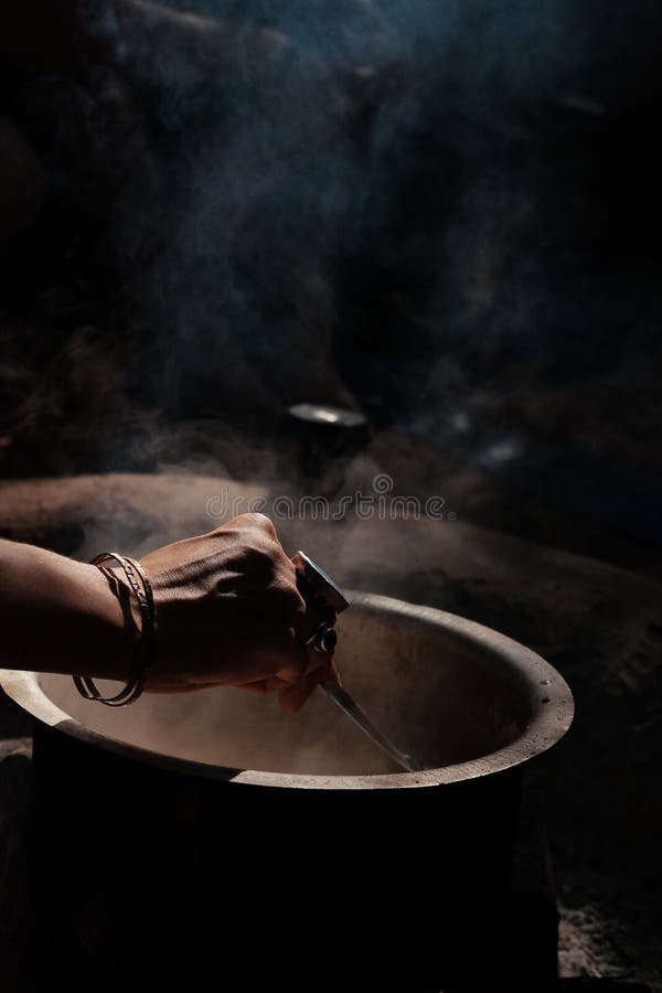 Hand Mixing Food in a Cauldron Stock Photo - Image of ring, forest ...