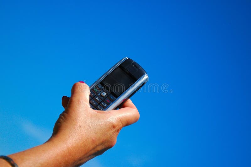 Hand with mobile phone stock image. Image of dating, cellular - 1572203