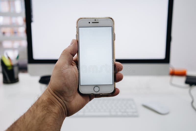 Hand with mobile phone stock image. Image of business - 165293469