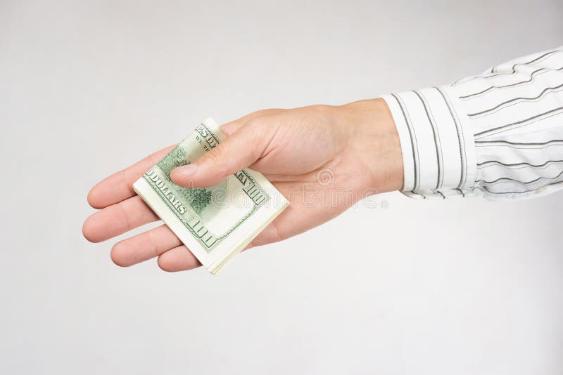 Hand with Money on a Gray Background Stock Photo - Image of holding ...