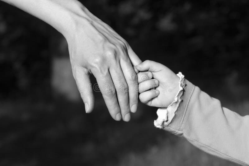 Hand of mother and child stock photo. Image of maternity - 41329510