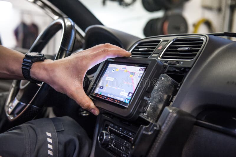 Hand Mounting Multimedia Device in Car Stock Photo - Image of device ...