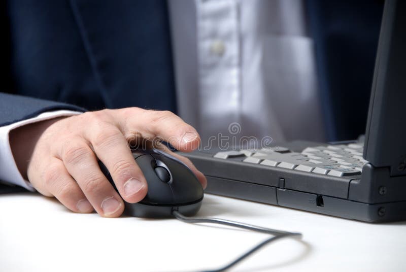 Hand On Mouse And Laptop Keyboard In The Back, Blured Stock Image ...