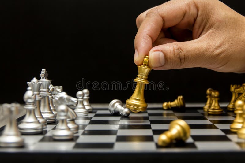 Hand move chess board game stock photo. Image of action - 217204040