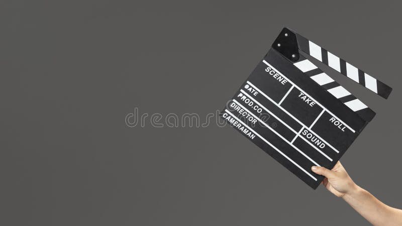 Hand with Movie Slate. High Quality Photo Stock Image - Image of black ...