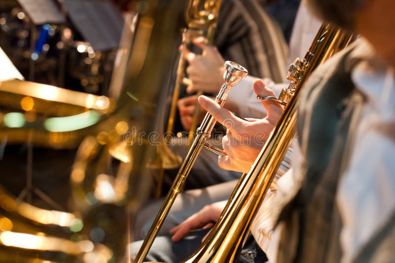 The Hand of a Musician Holding a Trombone Stock Image - Image of ...