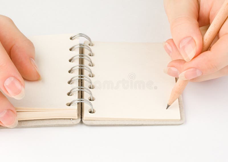 Hand and notepad stock photo. Image of paper, business - 18076988