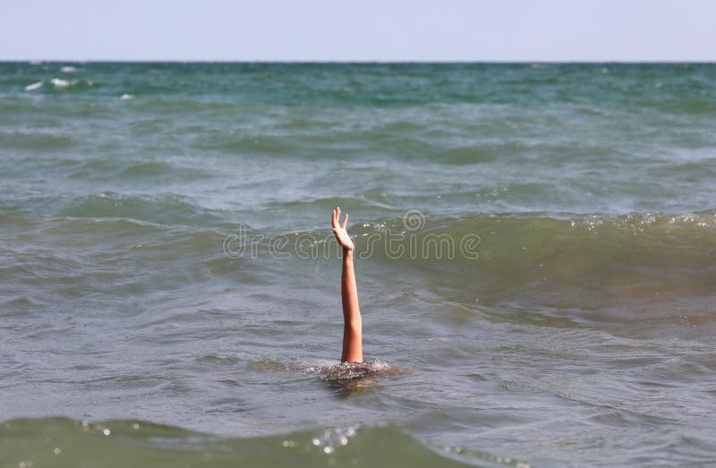 Hand of Man on the Ocean with Dramatic Toned Effect Stock Image - Image ...