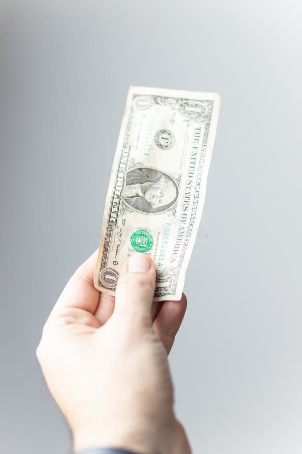 Hand Offering a US Dollar Bill Stock Photo - Image of monetary, capital ...
