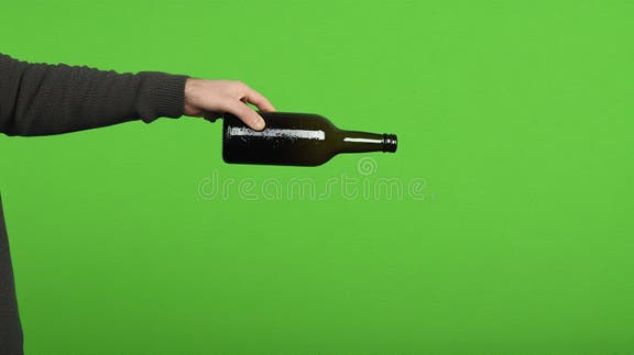 Hand Offers Empty Wine Bottle, Green Screen, Studio Stock Image - Image ...