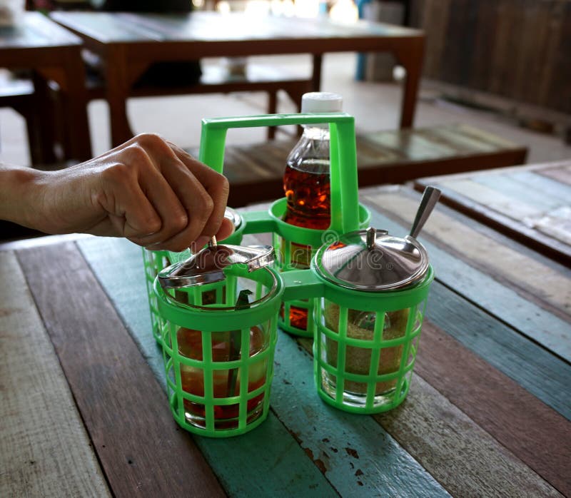 Hand Open Containers for Condiments Stock Photo - Image of stainless ...