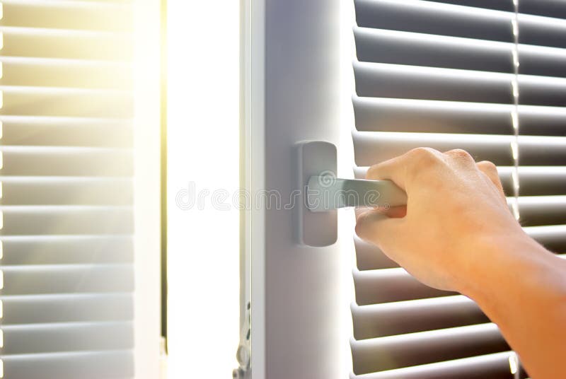 Hand open the jalousie. stock photo. Image of white, human - 14822594