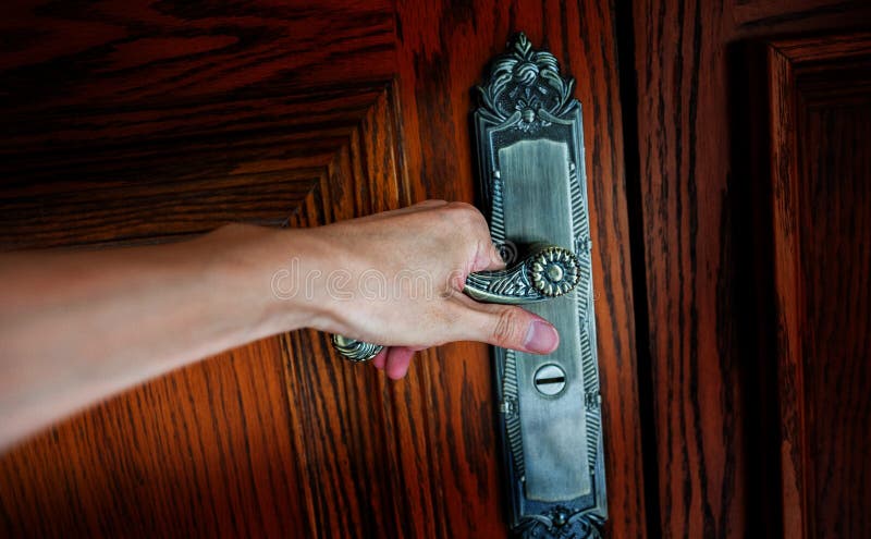 Hand opening door handle stock photo. Image of knob - 285335622