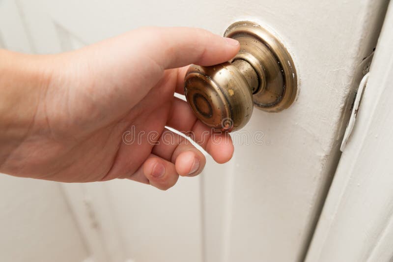 Hand opening the door stock image. Image of building - 56207297