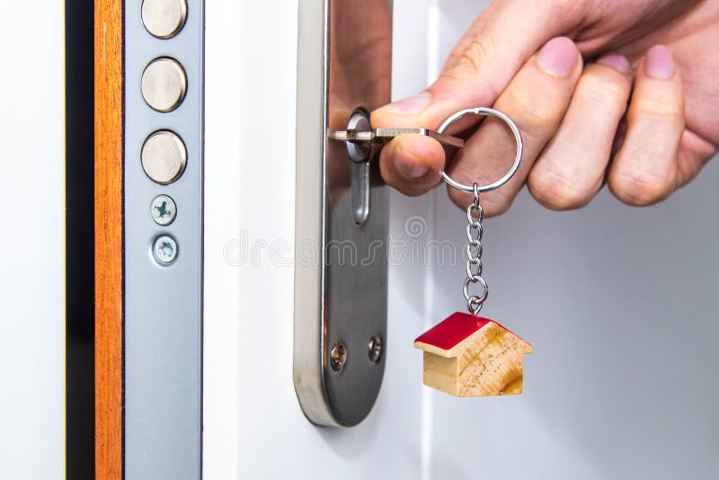 Hand Opening the Door with the Key Stock Image - Image of home, handle ...