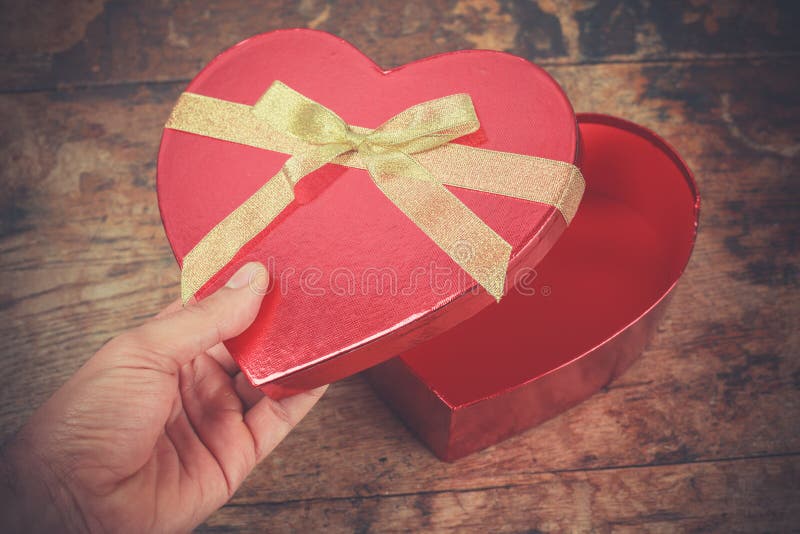Hand Opening Heart Shaped Box Stock Image - Image of person, shape ...