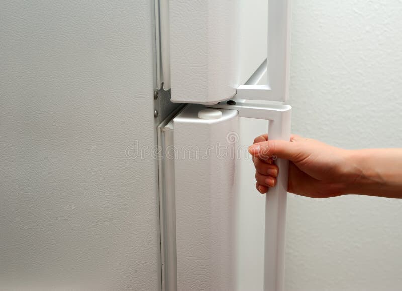 Hand opening refrigerator stock photo. Image of deliver - 56207348