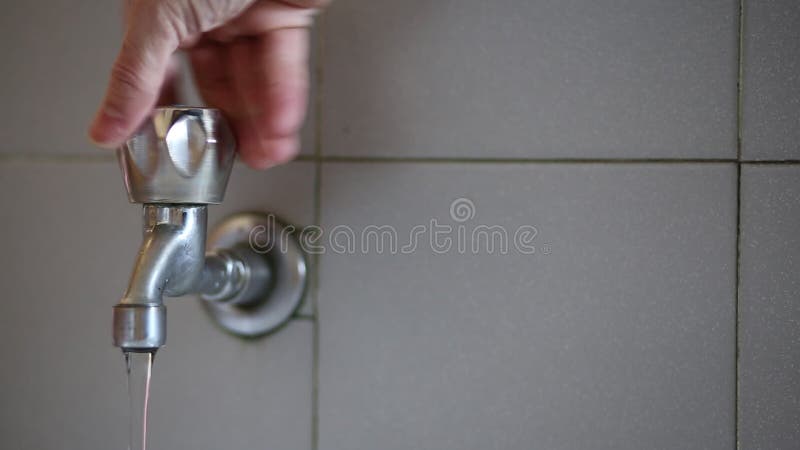 Hand Opening a Tap To Drain Drinking Water Stock Video - Video of taps ...