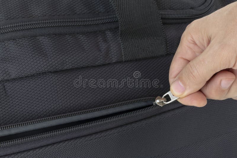Hand Opening the Zipper of a Black Bag Stock Photo - Image of carry ...