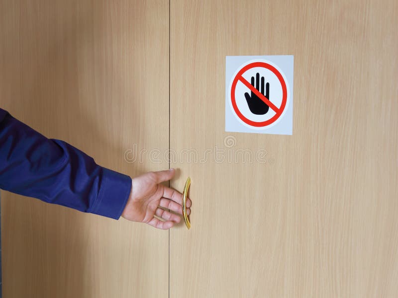 Hand Opens Door on Which Warning Sign of Ban, Stop Hand Stock Photo ...