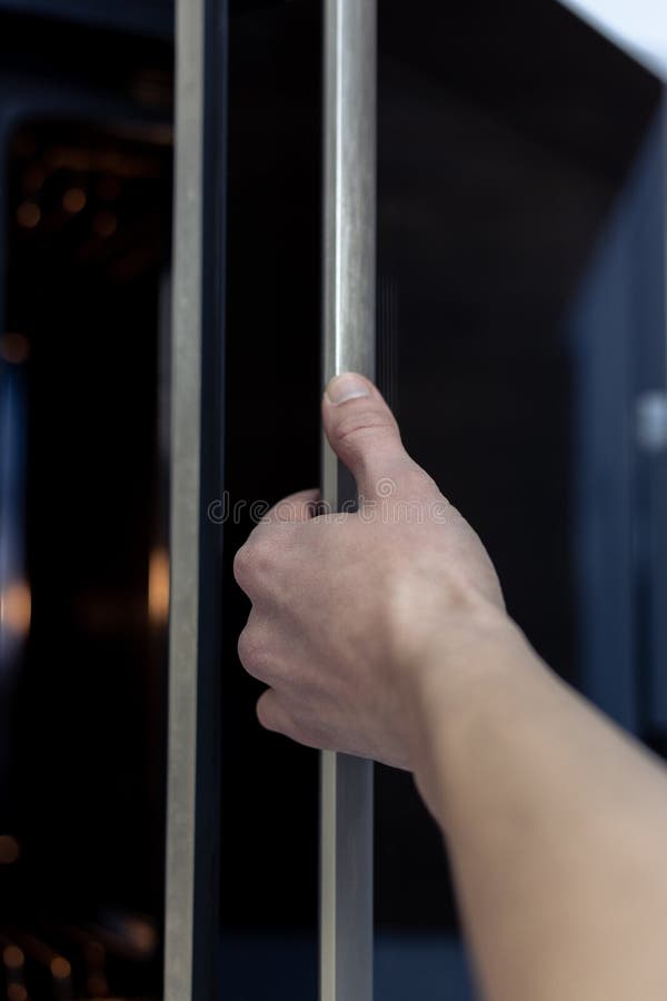 The Hand Opens the Oven Door. Kitchen Equipment Stock Image - Image of ...