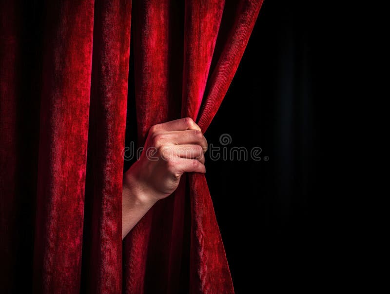 A Hand Opens a Vibrant Red Curtain Against a Dark Background Stock ...