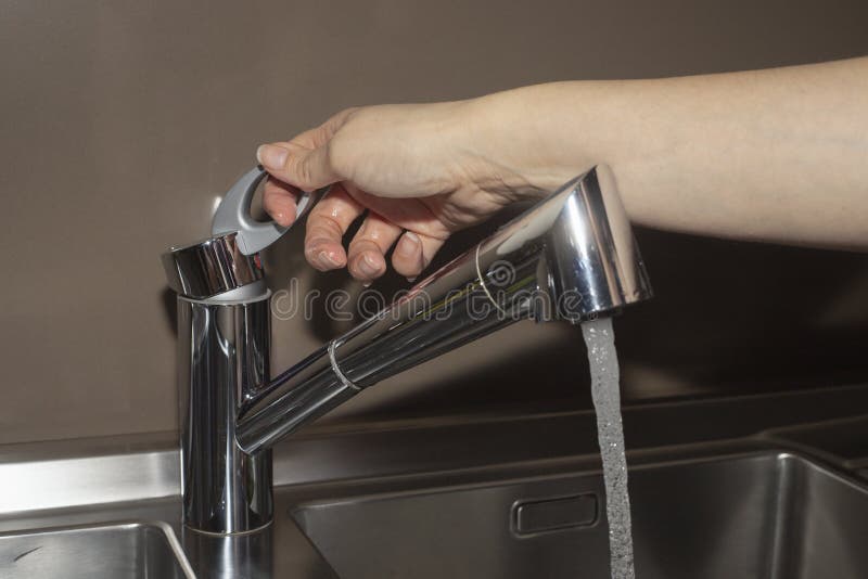 Hand Opens the Water Tap. Close Up Stock Photo - Image of school, hand ...