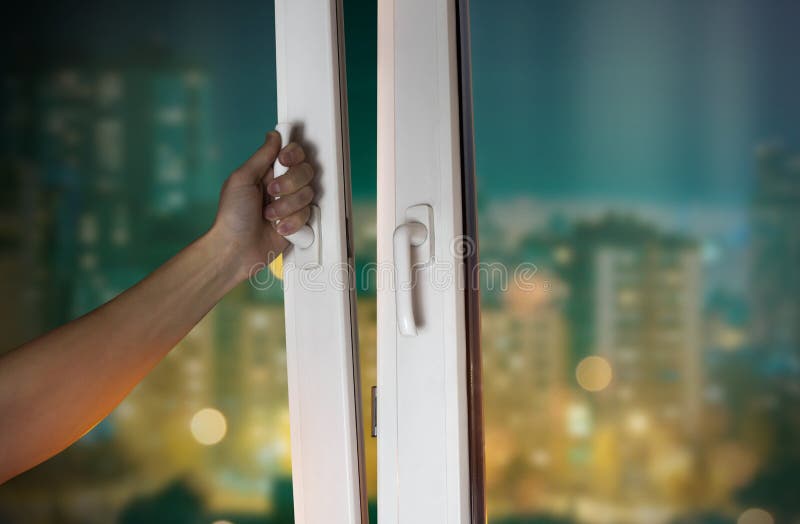 Hand Opens the Window with a View of the Night City Stock Image - Image ...