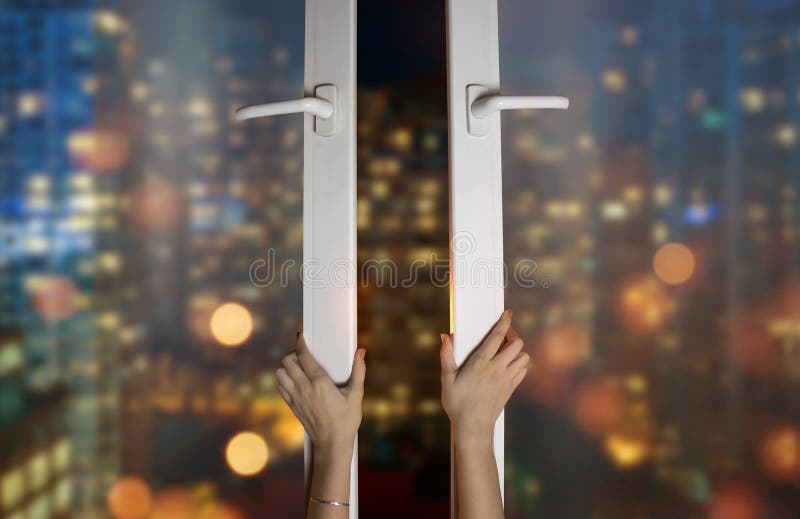 Hand Opens the Window with a View of the Night City Stock Photo - Image ...
