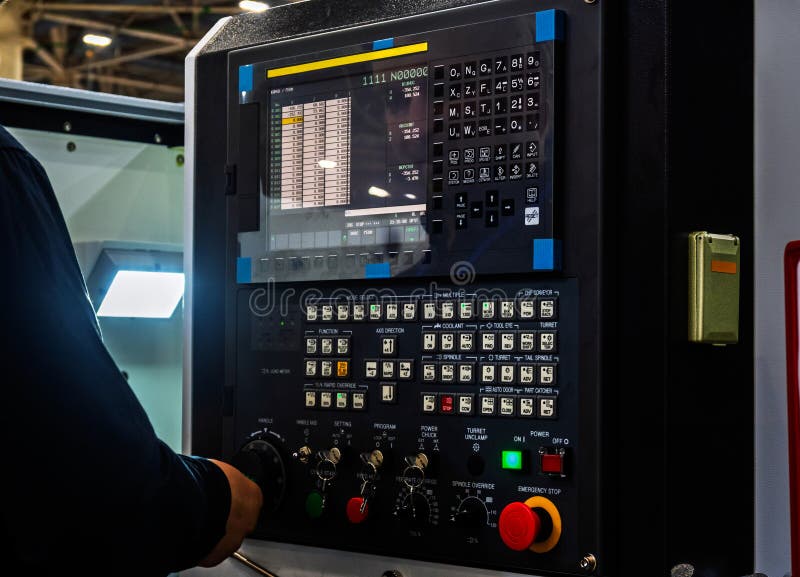 Hand Operates CNC Machine Control Panel in Factory Setting. Close-up ...