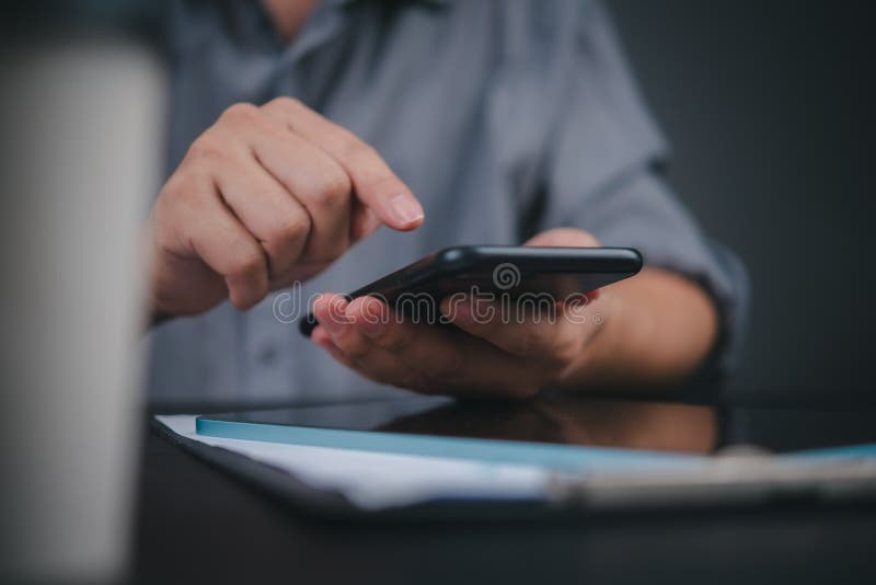 Hand Operating Cellphone at Workplace Desk, Business Lifestyle. Modern ...