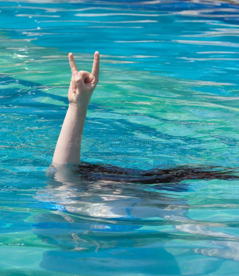 Hand Out of Water in Rock Gesture Stock Photo - Image of hope, element ...